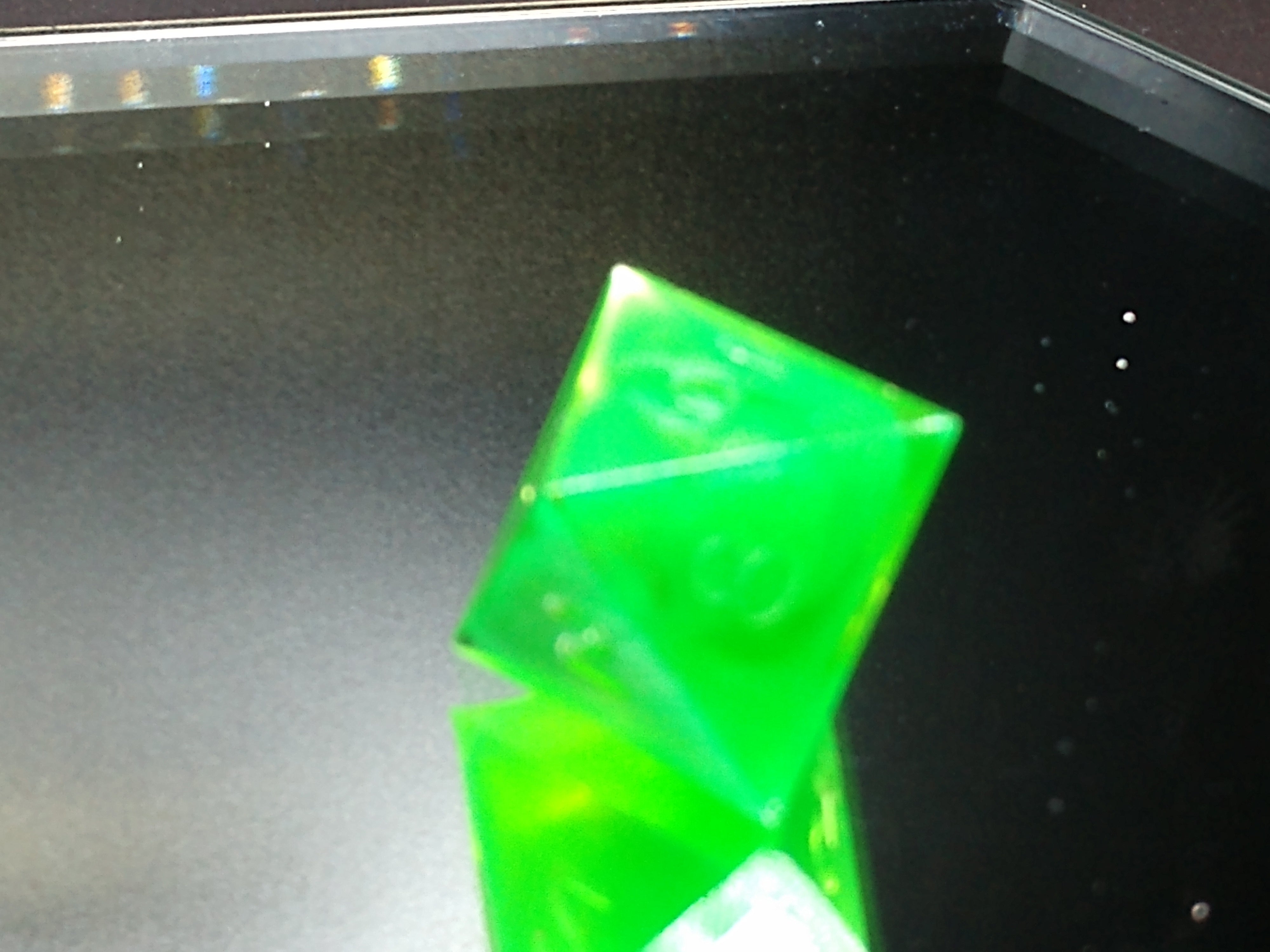 green swirl d8 – Threshold Diceworks